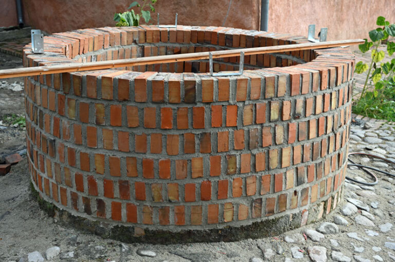 Old well in the garden - European Clay Bricks