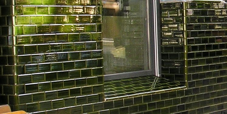 Green glazed bricks and slips for building plinth renovation - European Clay Bricks