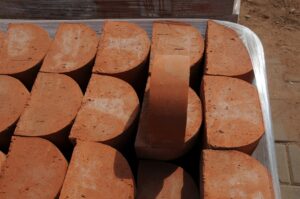 Shaped brick as crown for brick fence - European Clay Bricks